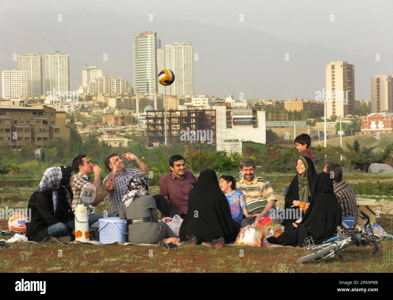 Iranian family members enjoy a picnic during the two-week holiday of ...