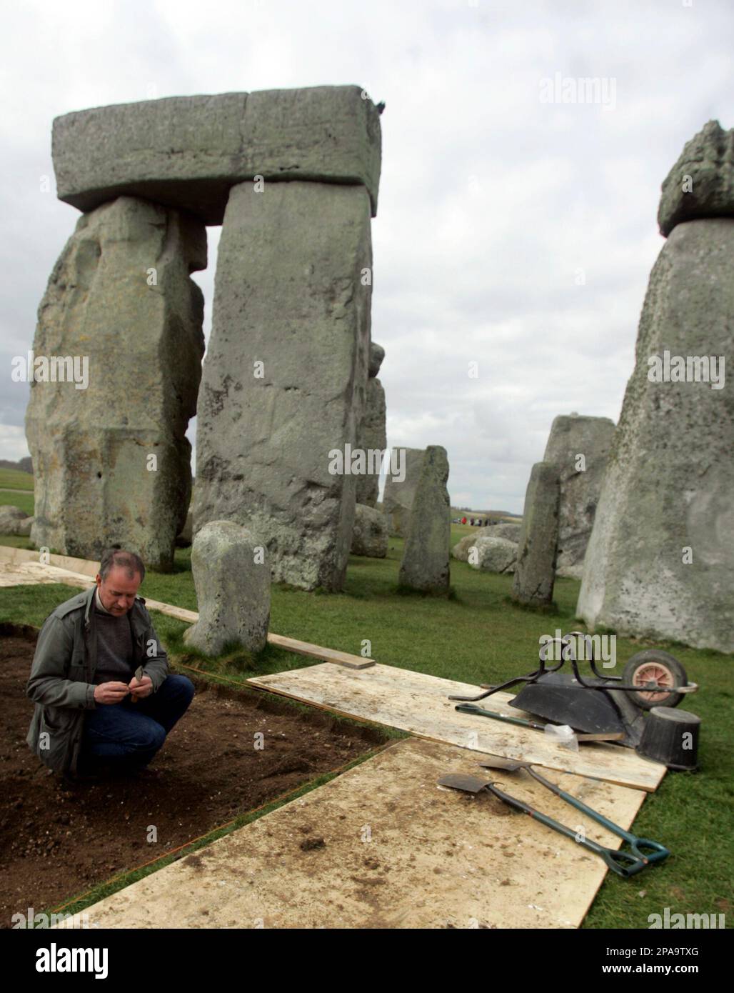 Professor Tim Darvill of University of Bournemouth works at Stonehenge ...
