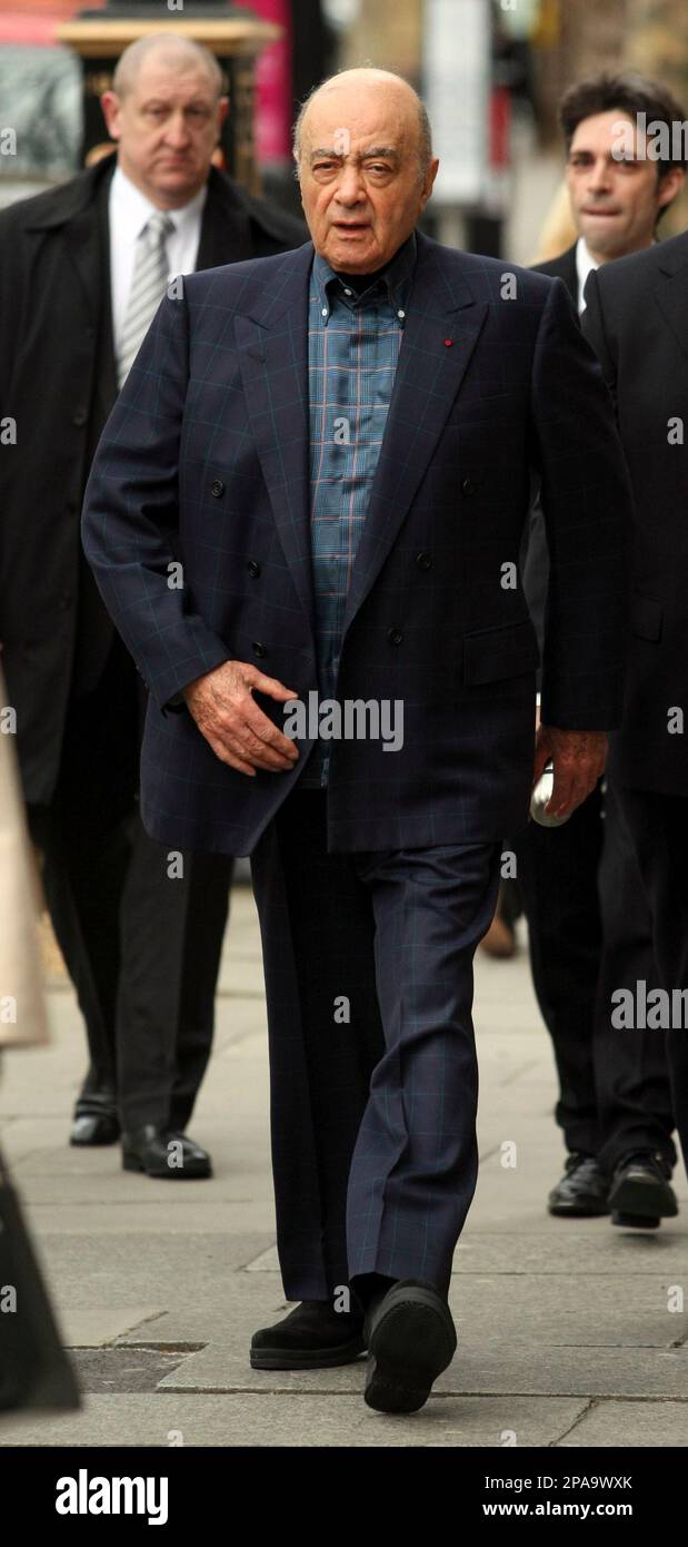 Mohamed Al Fayed, center, the father of Dodi Fayed, arrives at the High ...
