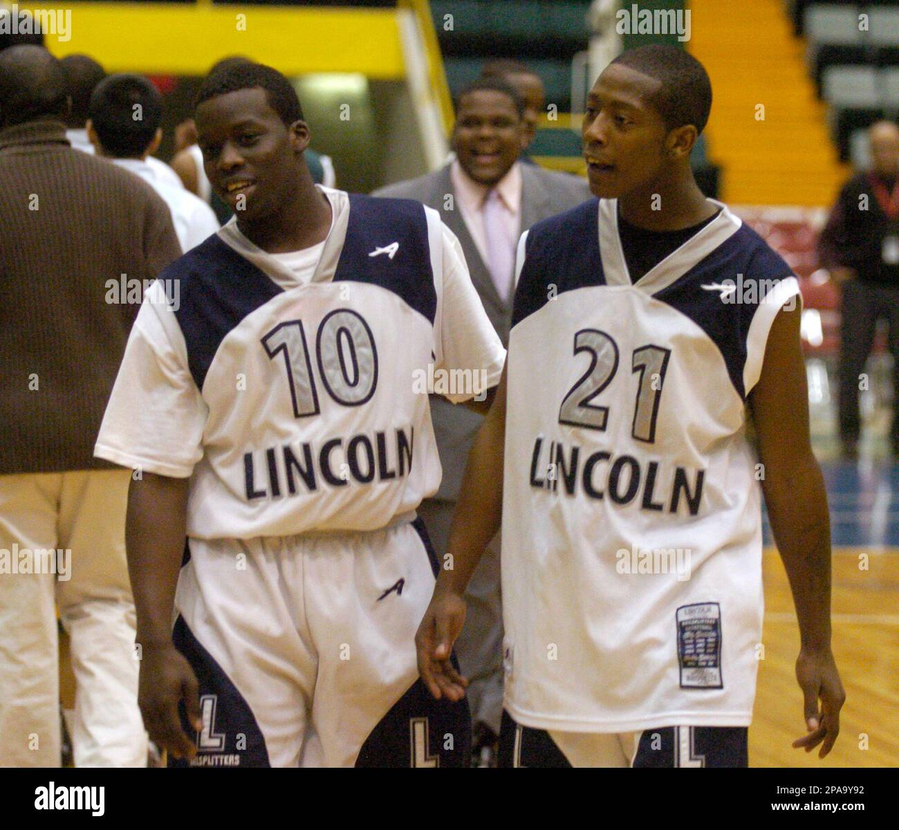 Abraham Lincoln's Codion Becker (10) and Timothy Flowers (21) leave the ...