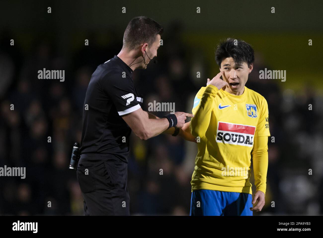Referee Wesli De Cremer and Westerlo's Yusuke Matsuo pictured after a soccer match between KVC ...