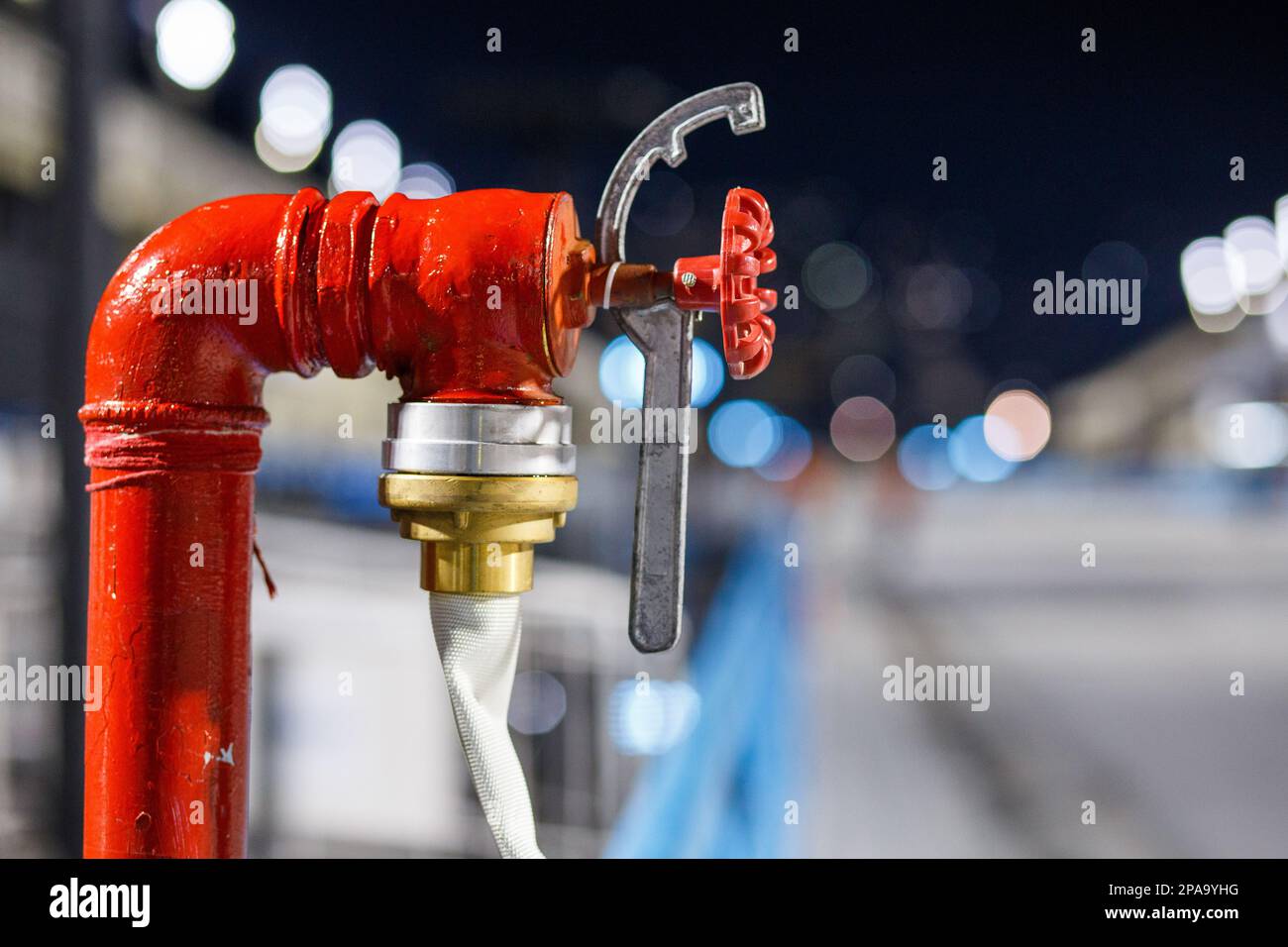 red fire hydrant with a white hose in Rio de Janeiro, Brazil Stock ...