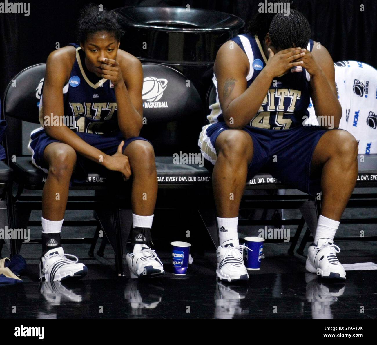 Pittsburgh's Taneisha Harrison, left, and Mercedes Walker, right, react ...
