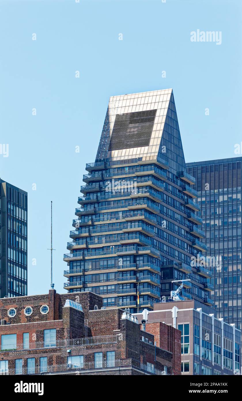 NYC Midtown: 100 United Nations Plaza has a wedge-shaped crown edged in ...