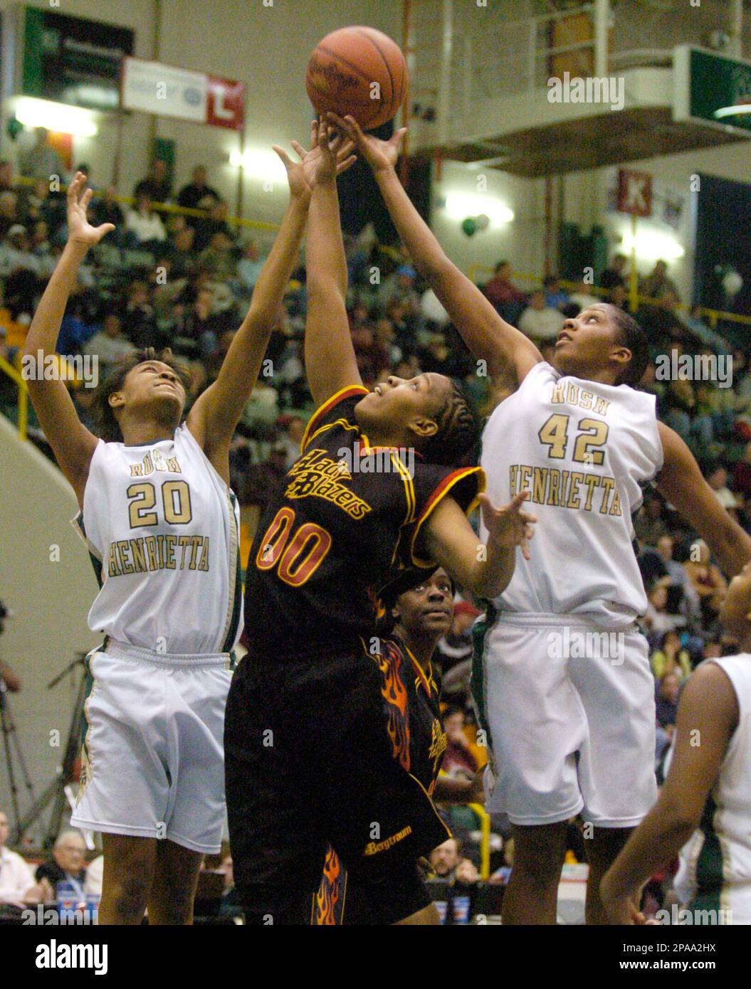 Murry Bergtraum's Tasha Bartlett (00) vies for a rebound with Rush ...