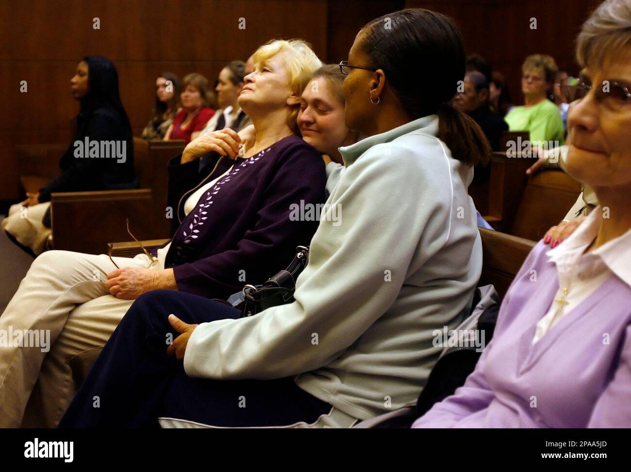 Marsha Morgan, left, mother of murder victim Wendy Morgan hugs Subrena ...