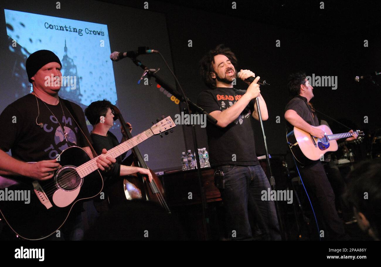Singer Adam Duritz, center, and the other members of the band Counting ...