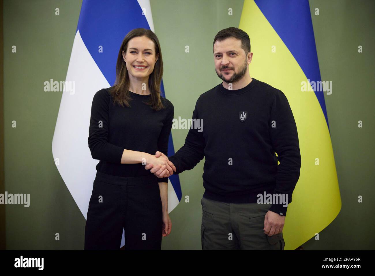 Kyiv, Ukraine. 10th Mar, 2023. Finnish Prime Minister Sanna Marin, left, shakes hands with ...