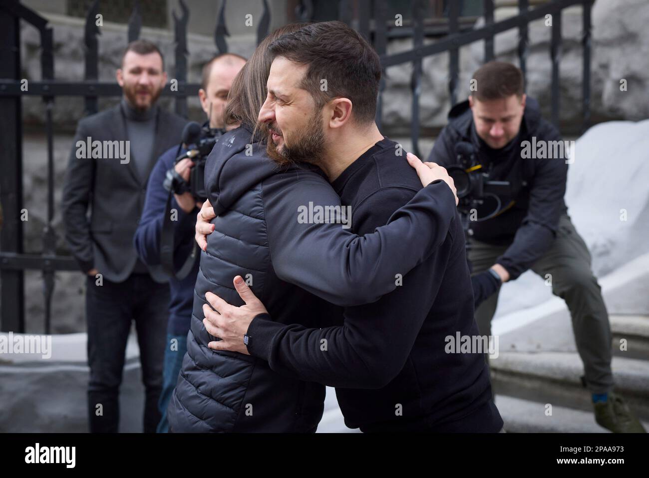 Kyiv, Ukraine. 10th Mar, 2023. Finnish Prime Minister Sanna Marin, left, embraces Ukrainian ...