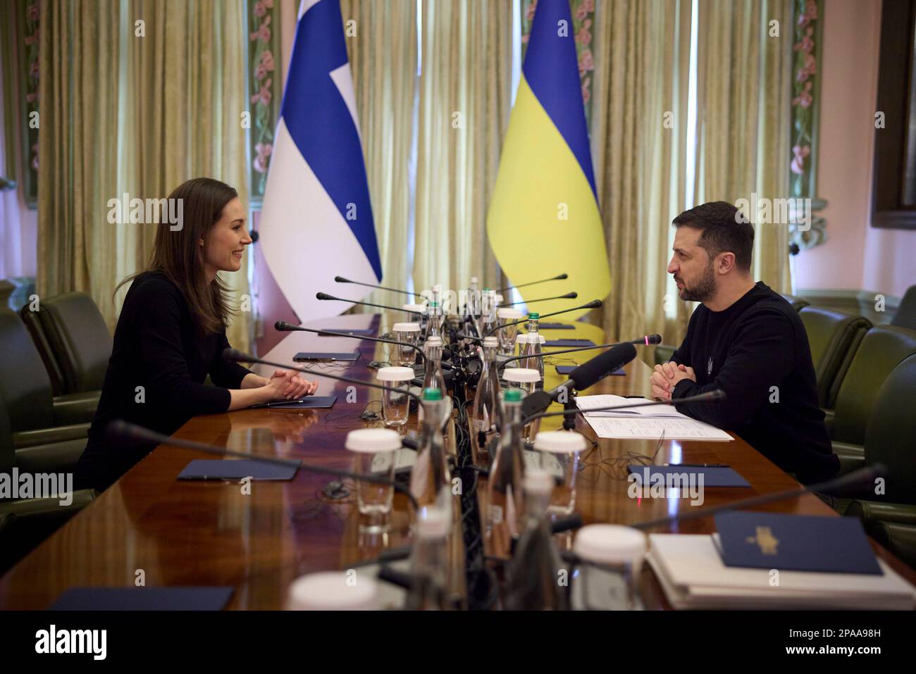 Kyiv, Ukraine. 10th Mar, 2023. Finnish Prime Minister Sanna Marin, left, listens during a one-on ...