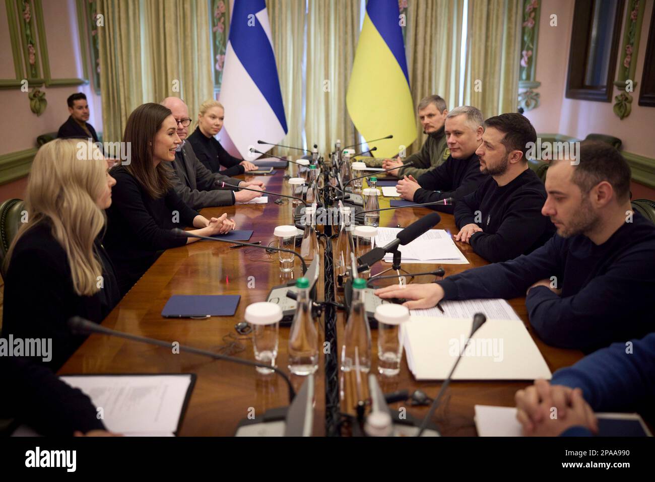 Kyiv, Ukraine. 10th Mar, 2023. Finnish Prime Minister Sanna Marin, left, listens during an ...