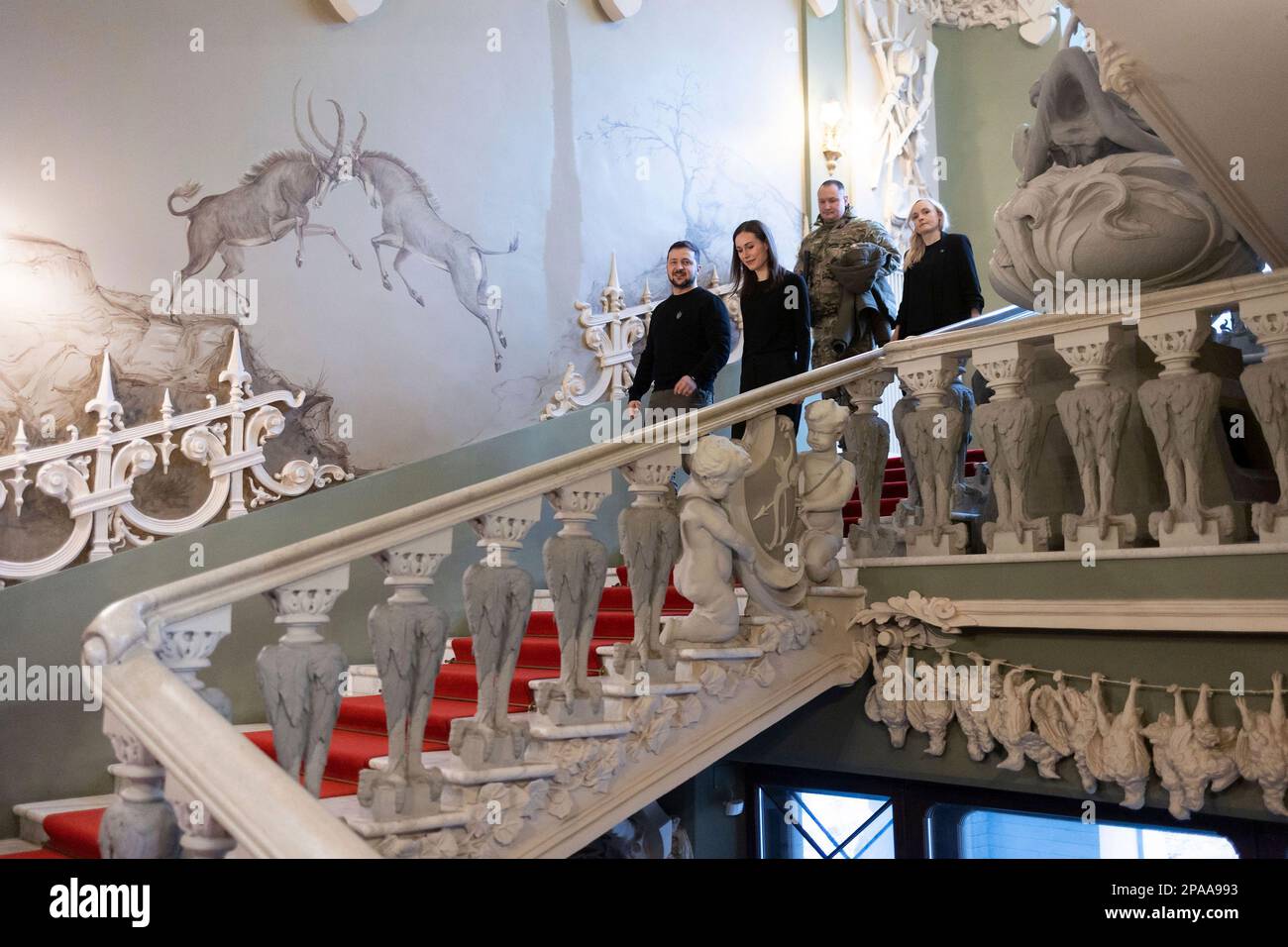 Kyiv, Ukraine. 10th Mar, 2023. Finnish Prime Minister Sanna Marin, right, is escorted by ...