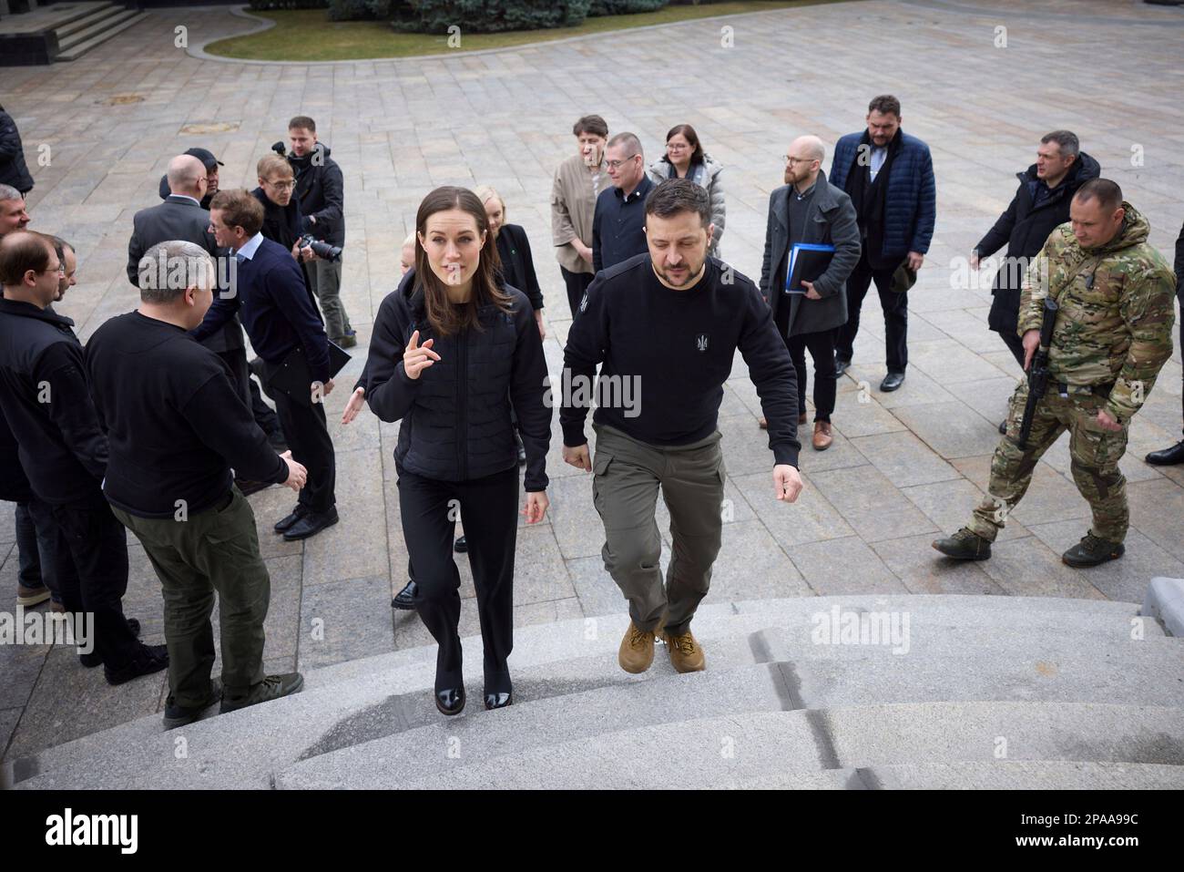 Kyiv, Ukraine. 10th Mar, 2023. Finnish Prime Minister Sanna Marin, left, is escorted by ...