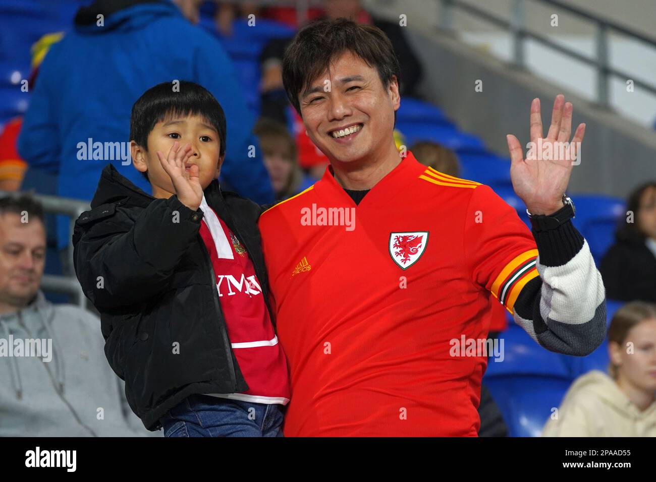 Welsh football supporters at Cardiff City Stadium, father and son Stock ...