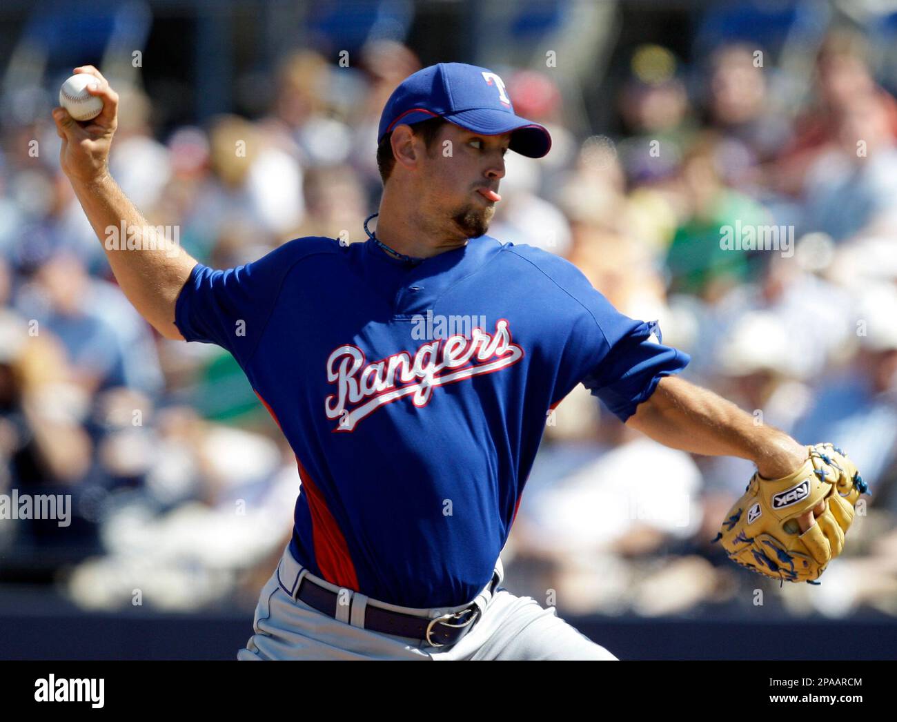 Texas Rangers pitcher Eric Hurley throws to the Seattle Mariners in the ...