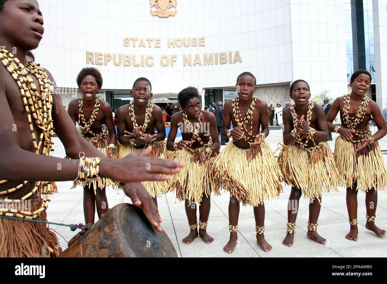 A group of Namibian dancers in traditional dress, participate in the ...