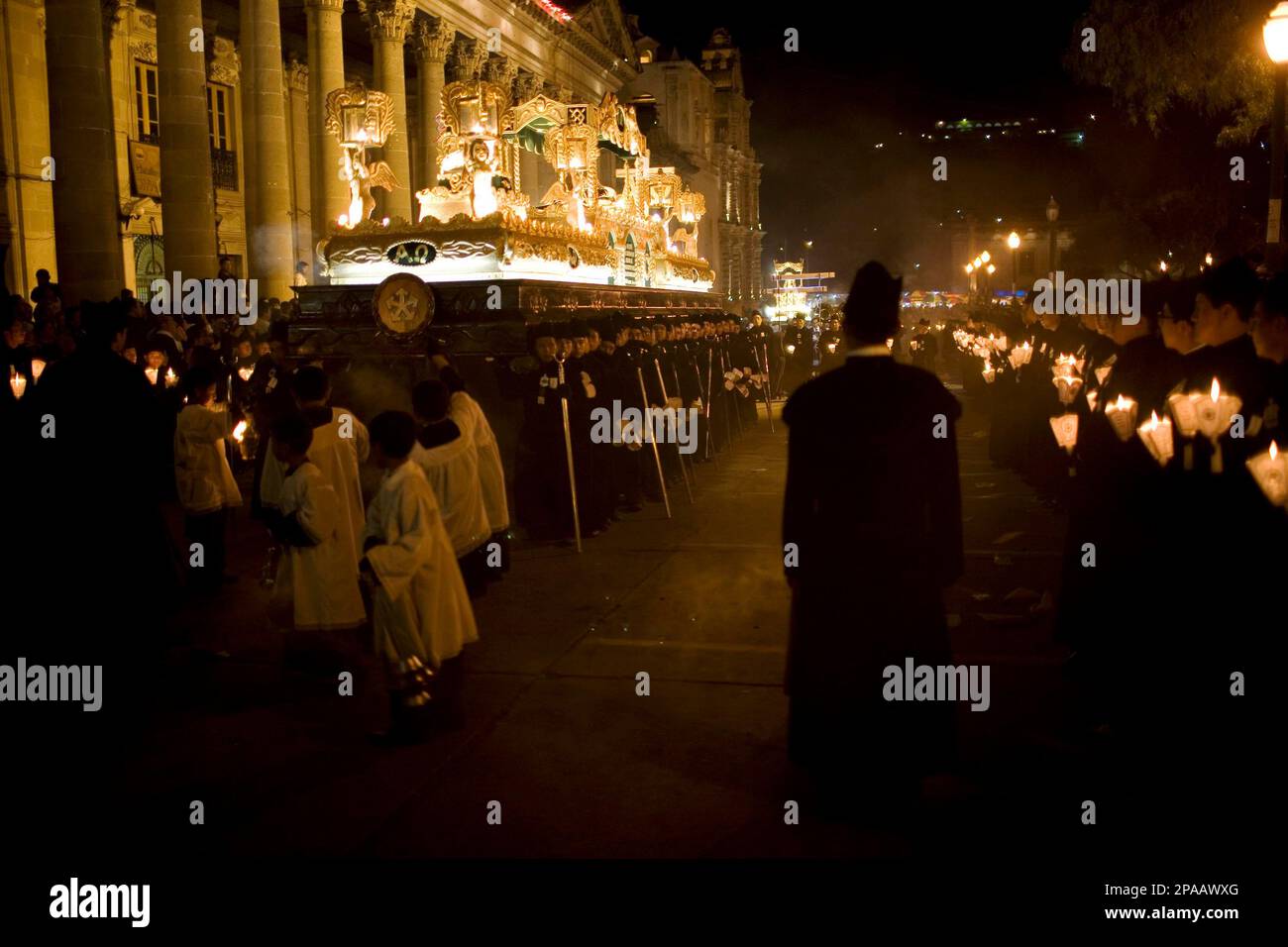 Parishioners take part in a Good Friday procession in Quetzaltenango ...