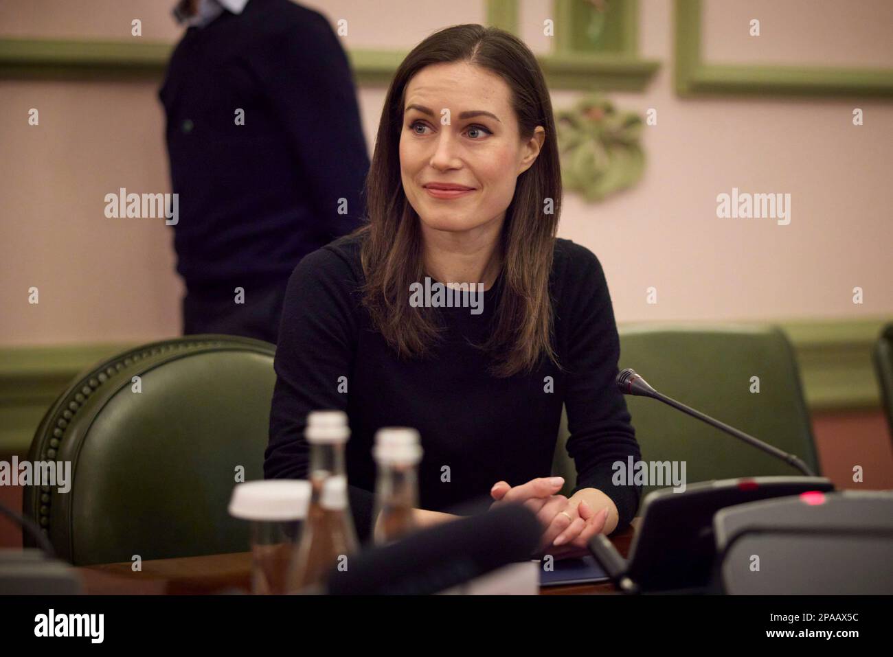 Kyiv, Ukraine. 10th Mar, 2023. Finnish Prime Minister Sanna Marin, left, listens during an ...
