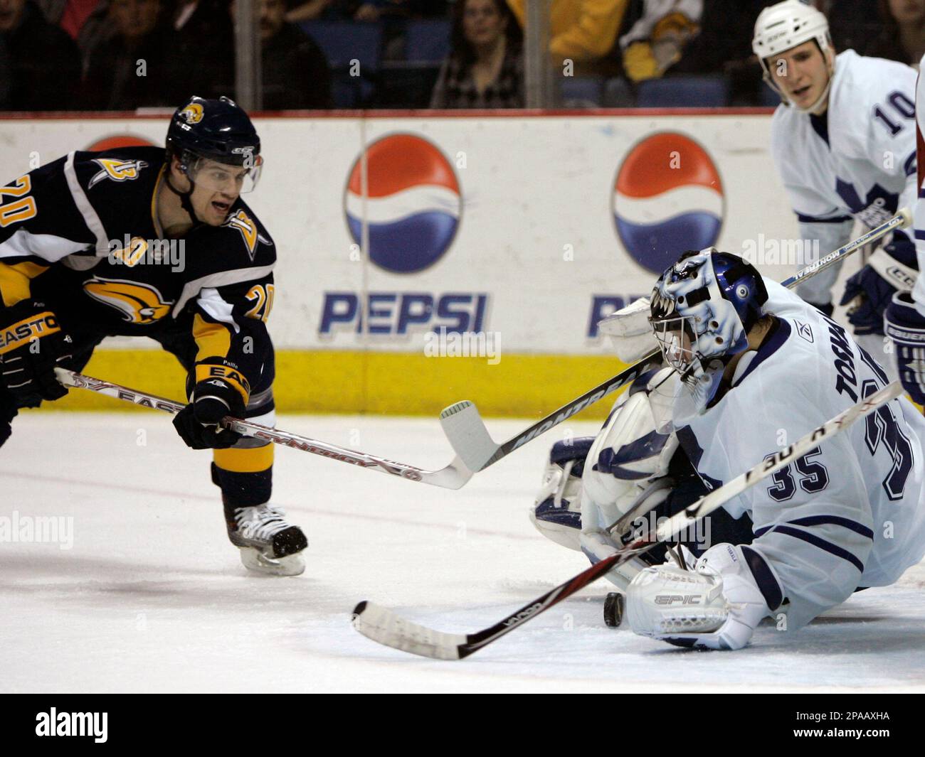 Buffalo Sabres' Daniel Paille (20) shoots the puck on Toronto Maple ...