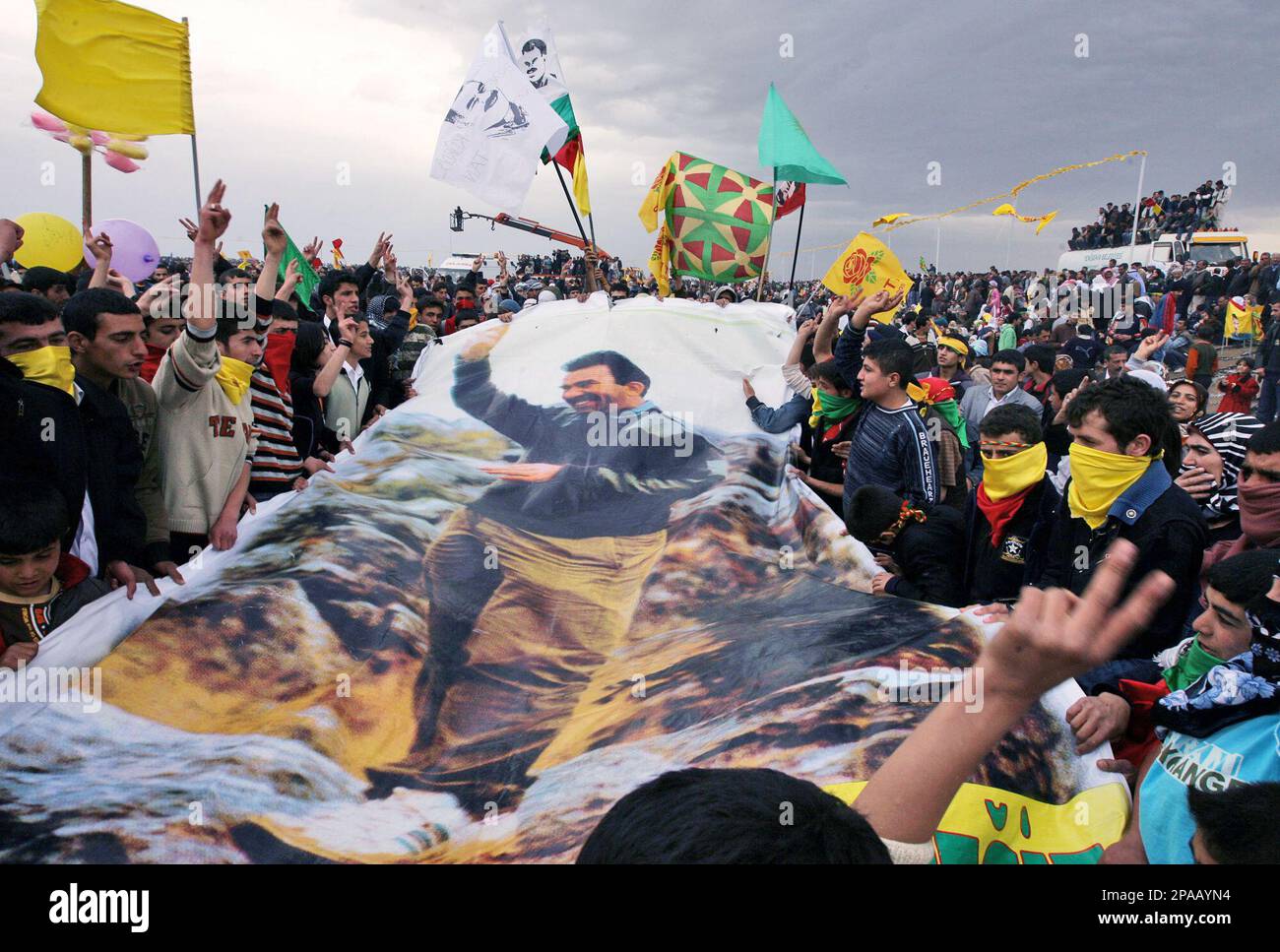 Turkish Kurds, some of them holding flags of the outlawed Kurdistan ...