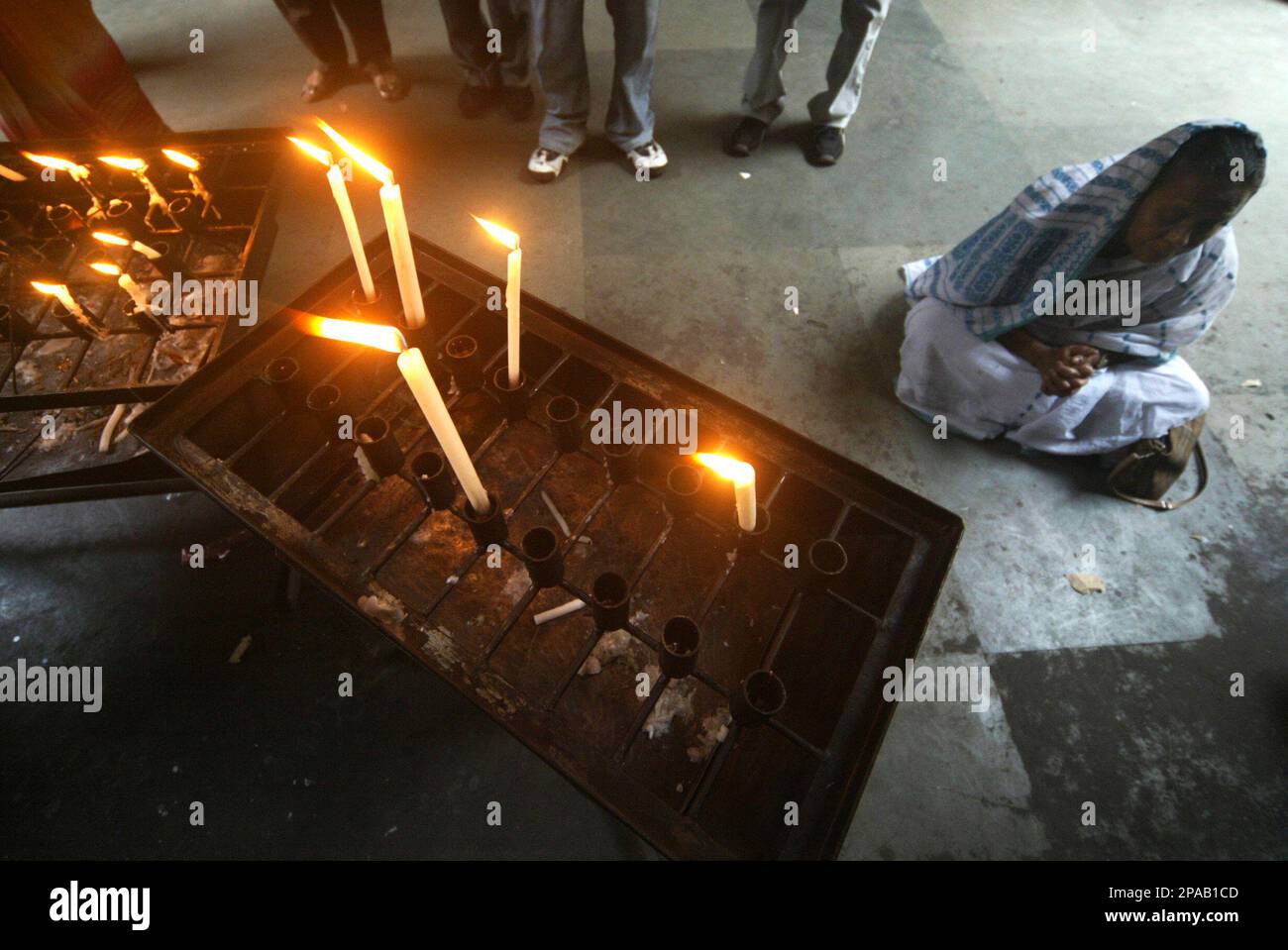 Indian Catholics pray at a church on Good Friday in Calcutta, India ...