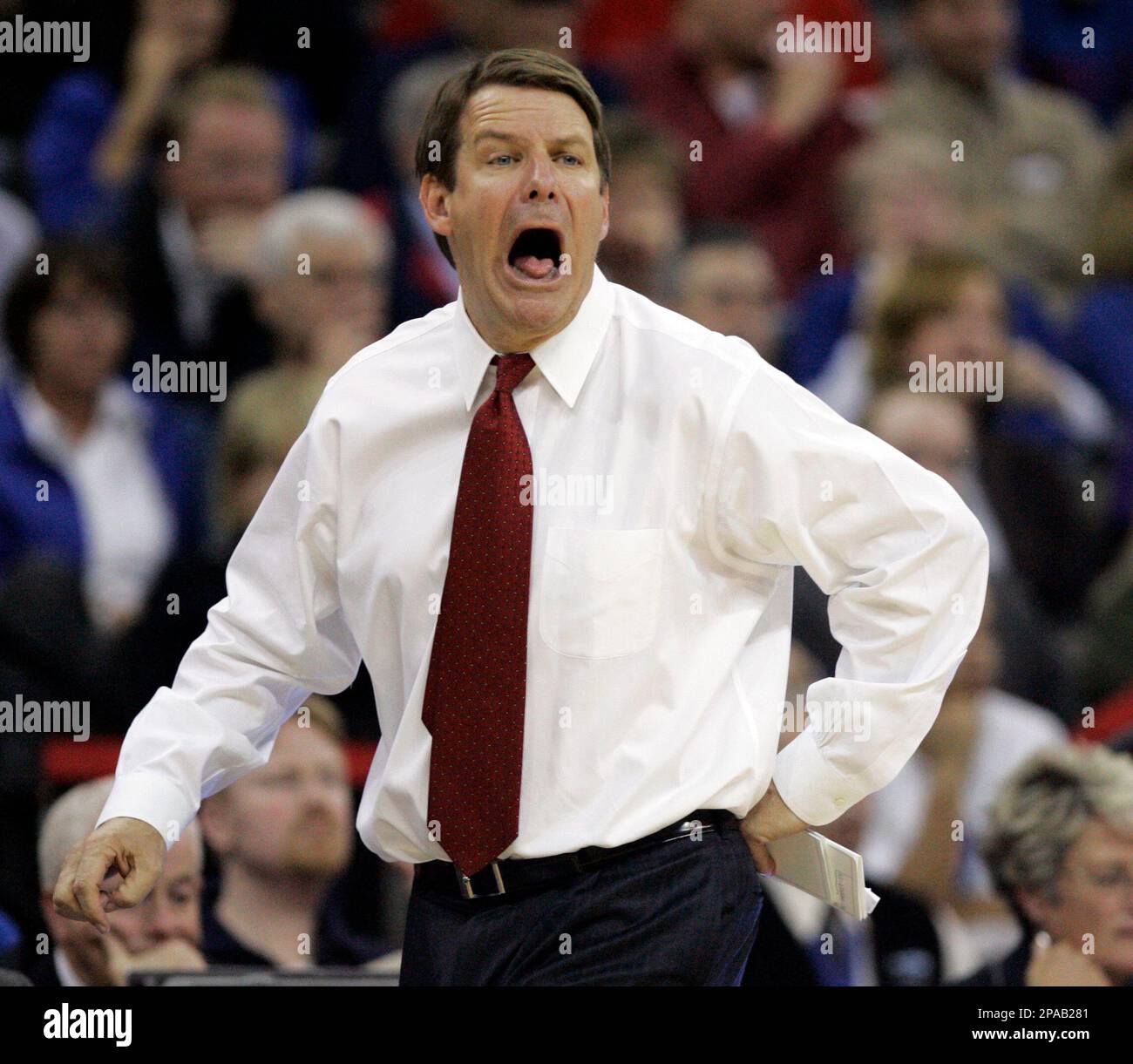 Southern California coach Tim Floyd calls in a play during the first ...