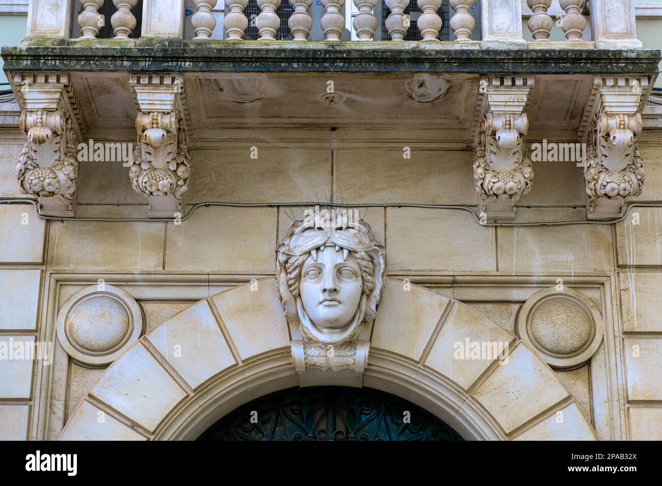 Stone carving with a female likeness inside the mouth of a lion, Lisbon ...