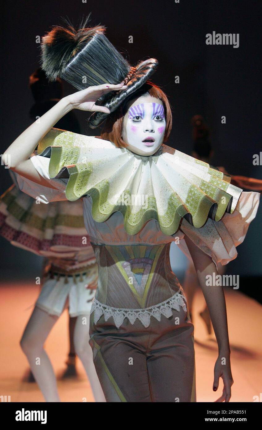 A model displays a design by L’Oreal Professionnel during Bangkok ...