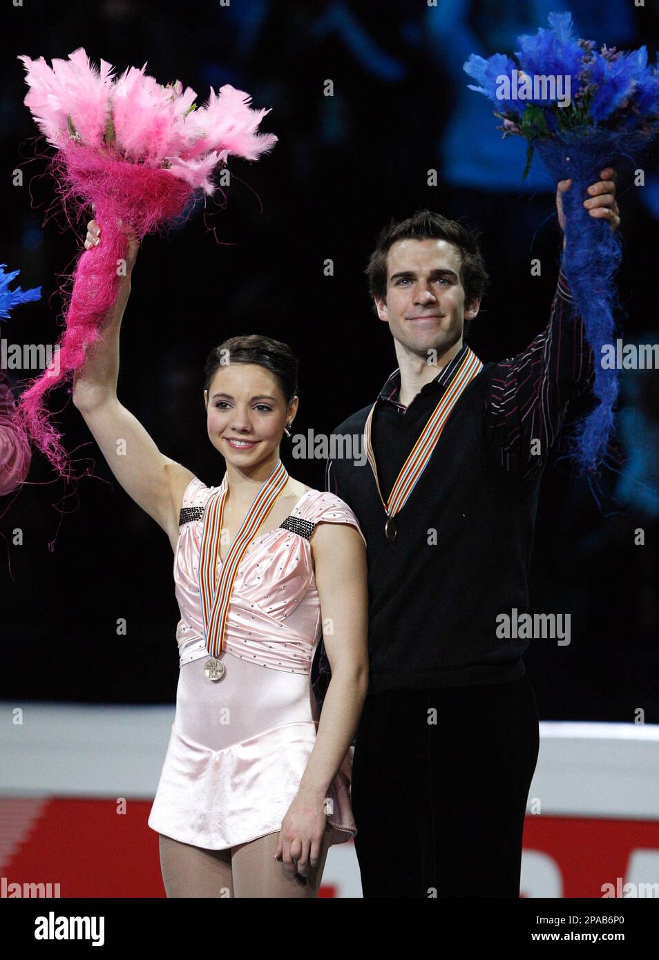 Canada's Jessica Dube and Bryce Davison wave from the podium after ...