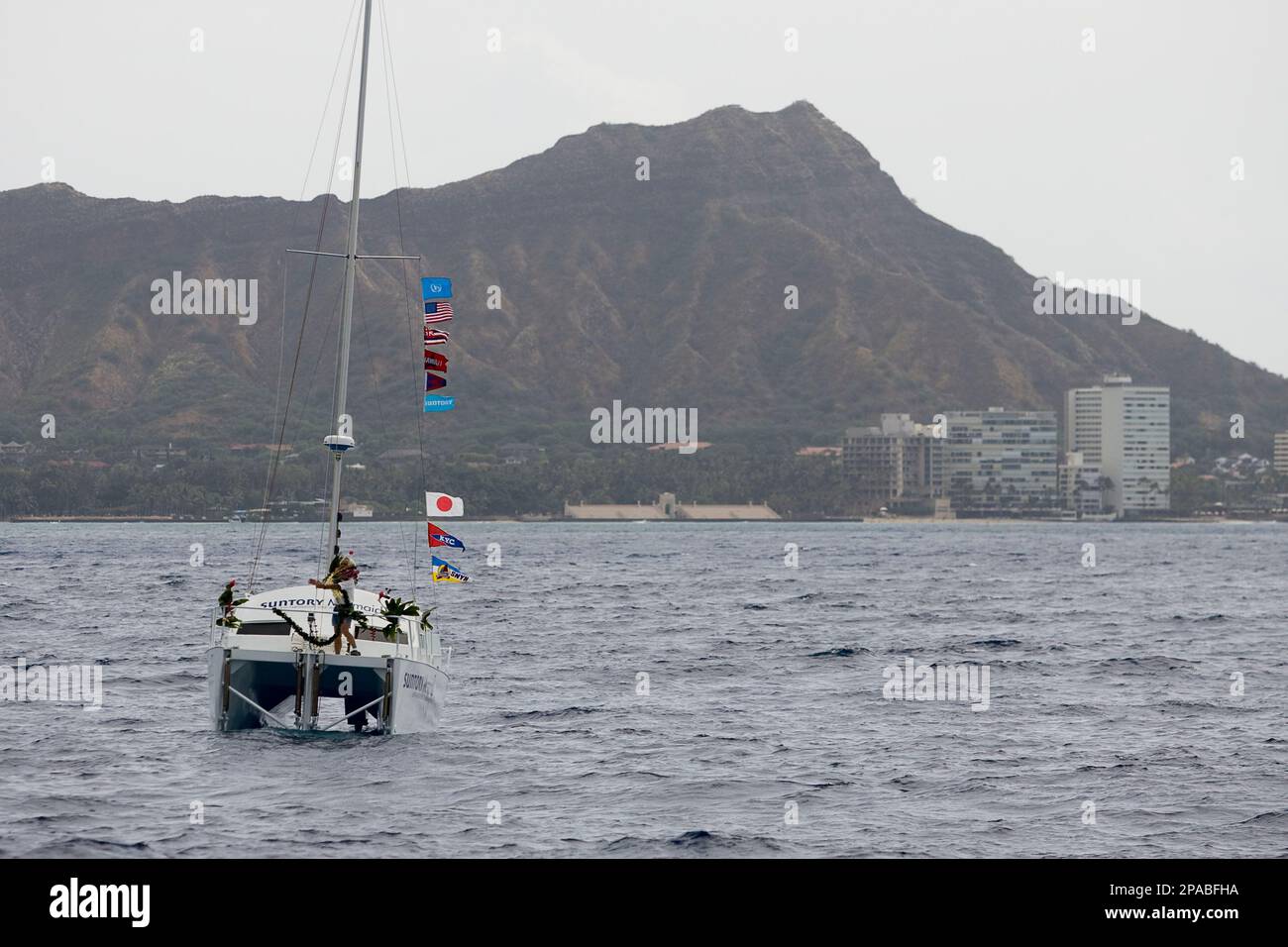 With Diamond Head in the background, Ken-ichi Horie waves goodbye ...