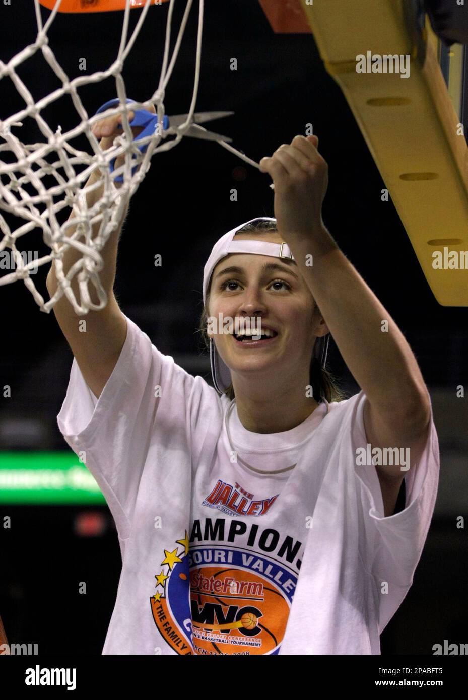 Illinois State's Kristi Cirone cuts down a piece of net after her team ...