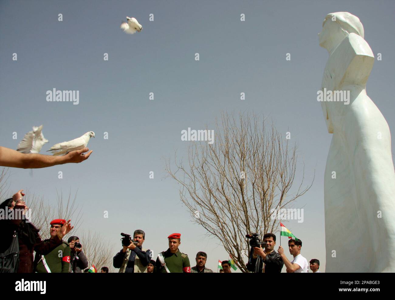 Doves are release by a monument for the victims of Halabja massacre on ...
