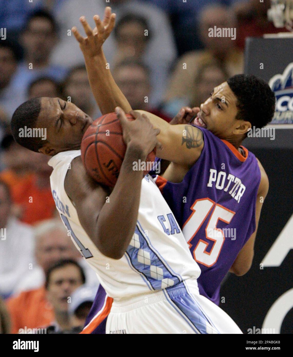 North Carolina's Deon Thompson, left, battles Clemson's David Potter ...