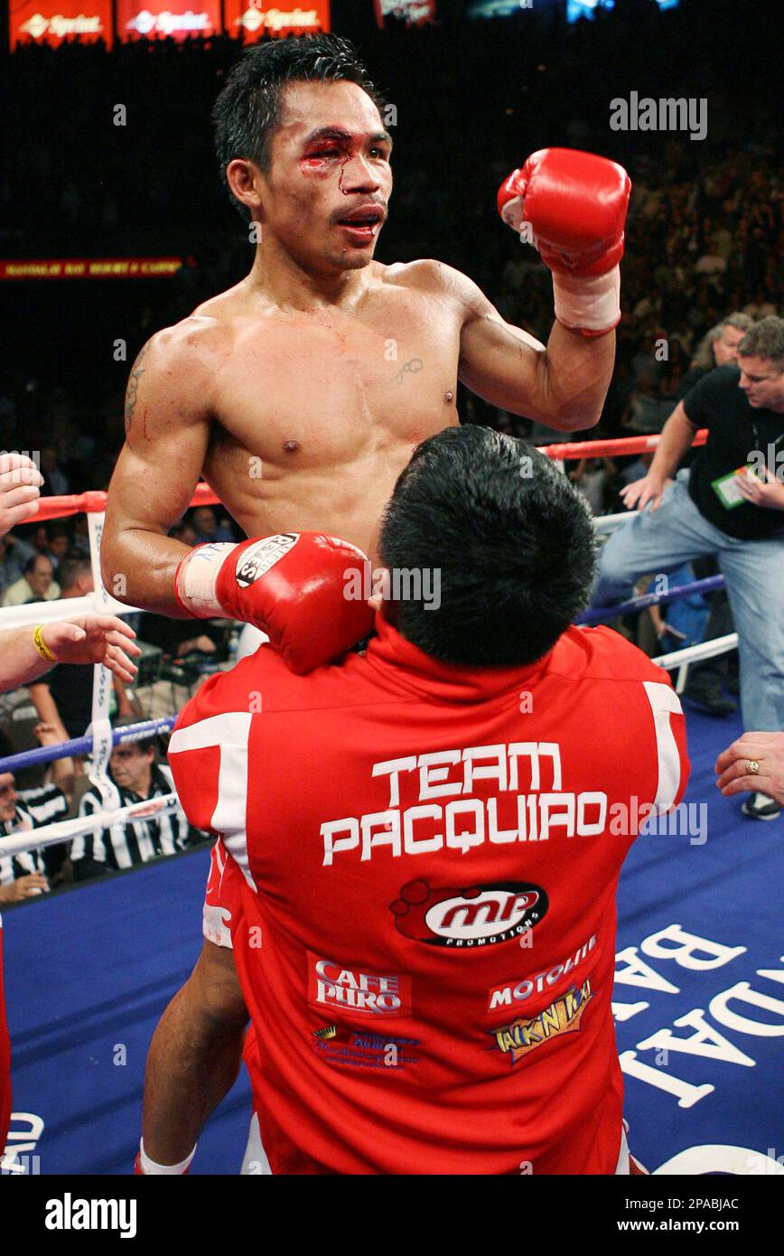 Manny Pacquiao, of the Philippines celebrates his victory Juan Manuel ...