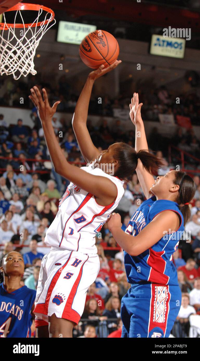 Butler's Tiara Hopper, left, shoots as Franklin's Chastity Gooch ...