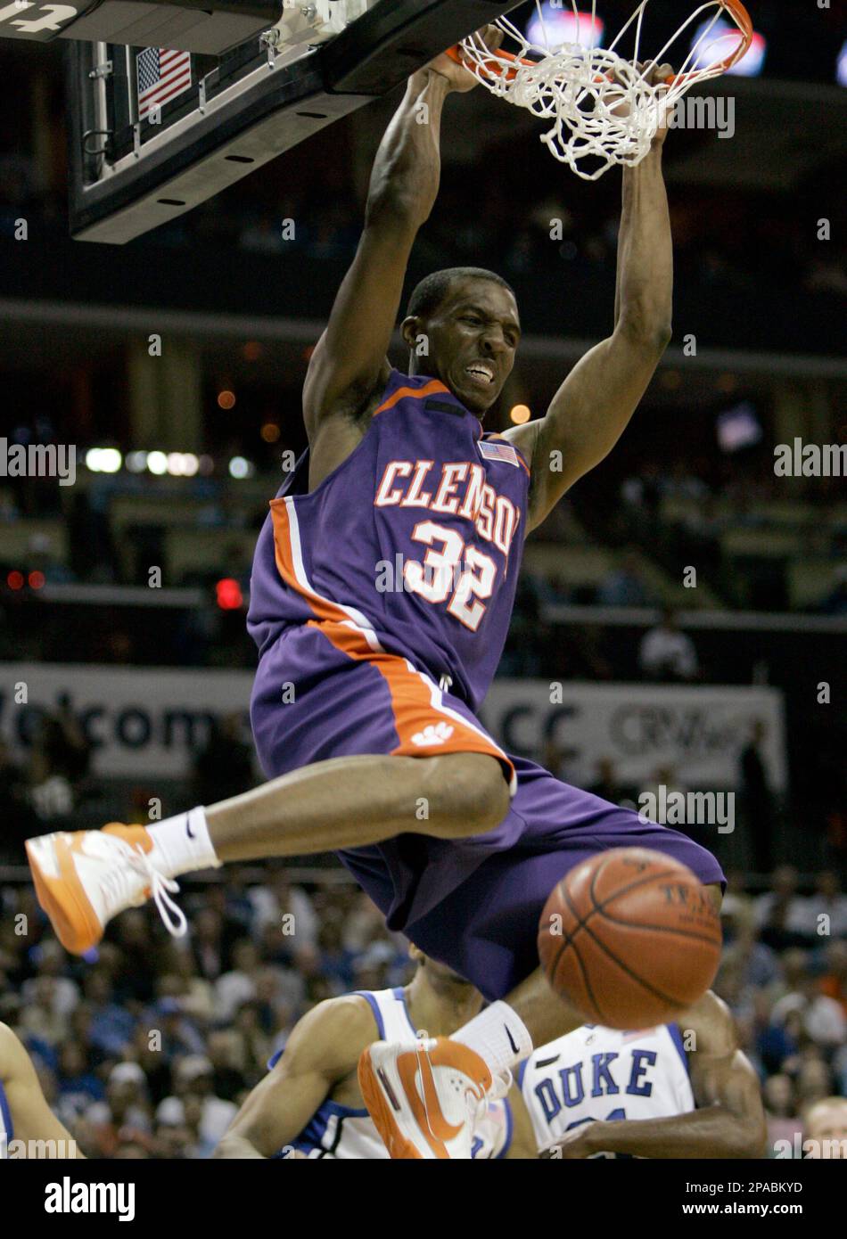 Clemson's Sam Perry (32) dunks during the first half of their game ...