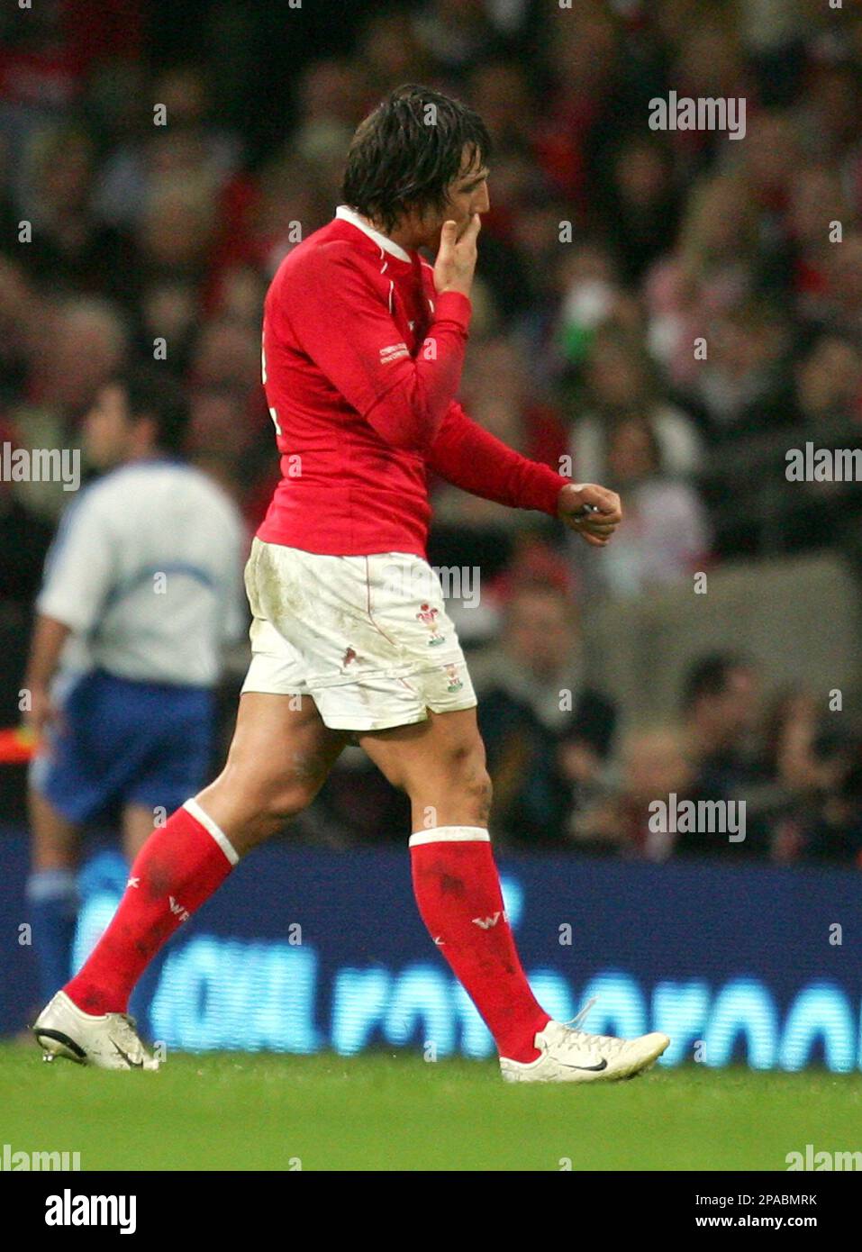 Wales' Gavin Henson walks to the bench after being shown the yellow ...