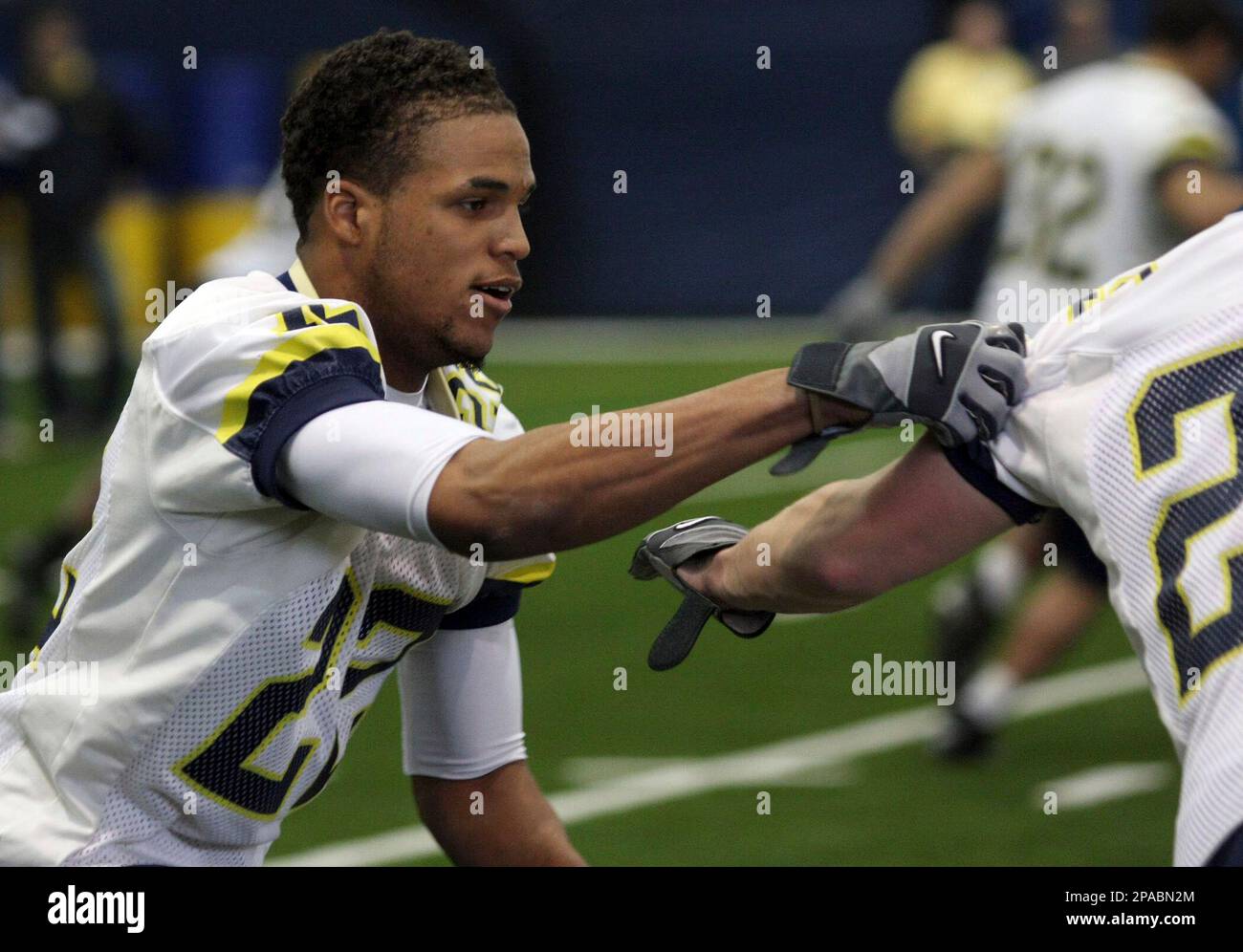 Michigan wide receiver Darryl Stonum, left, takes part in a drill in a ...