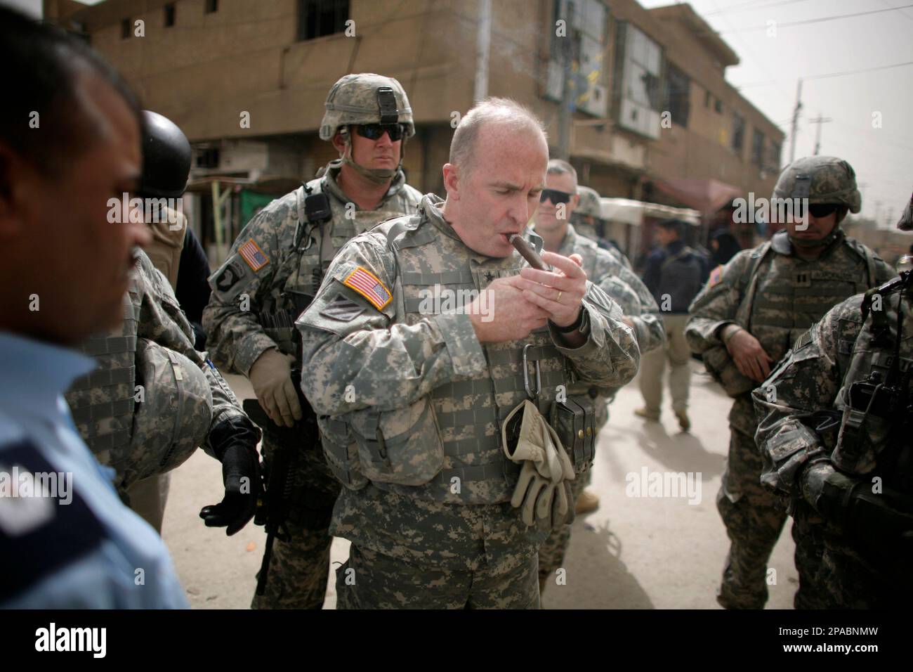 Major General Rick Lynch, center, commander of the U.S. Third Infantry ...
