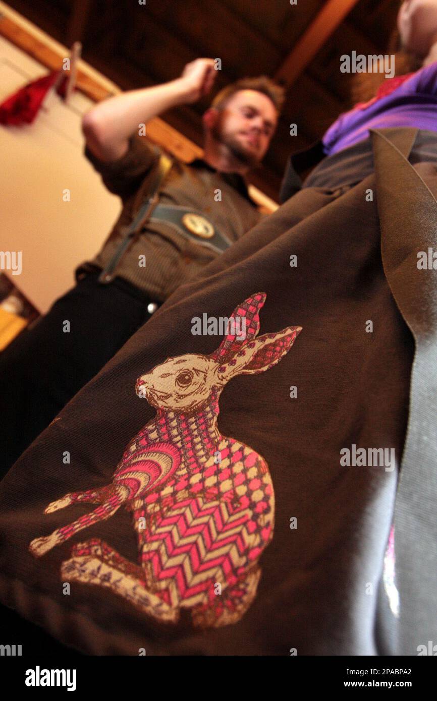 Fashion designer Jared Gold is shown with his trademark bunny on a ...