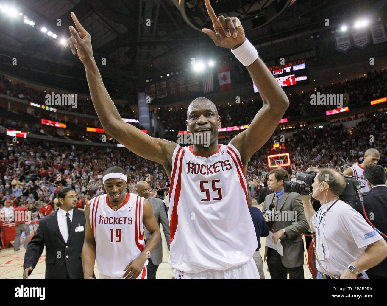 Houston Rockets' Dikembe Mutombo (55), of Congo, celebrates after ...