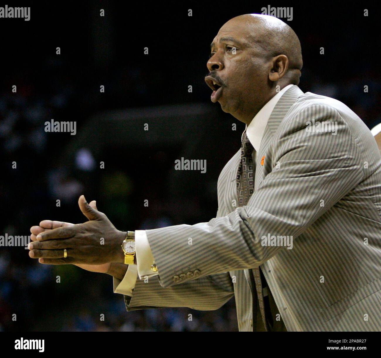 Clemson coach Oliver Purnell encourages his team as they play Boston ...