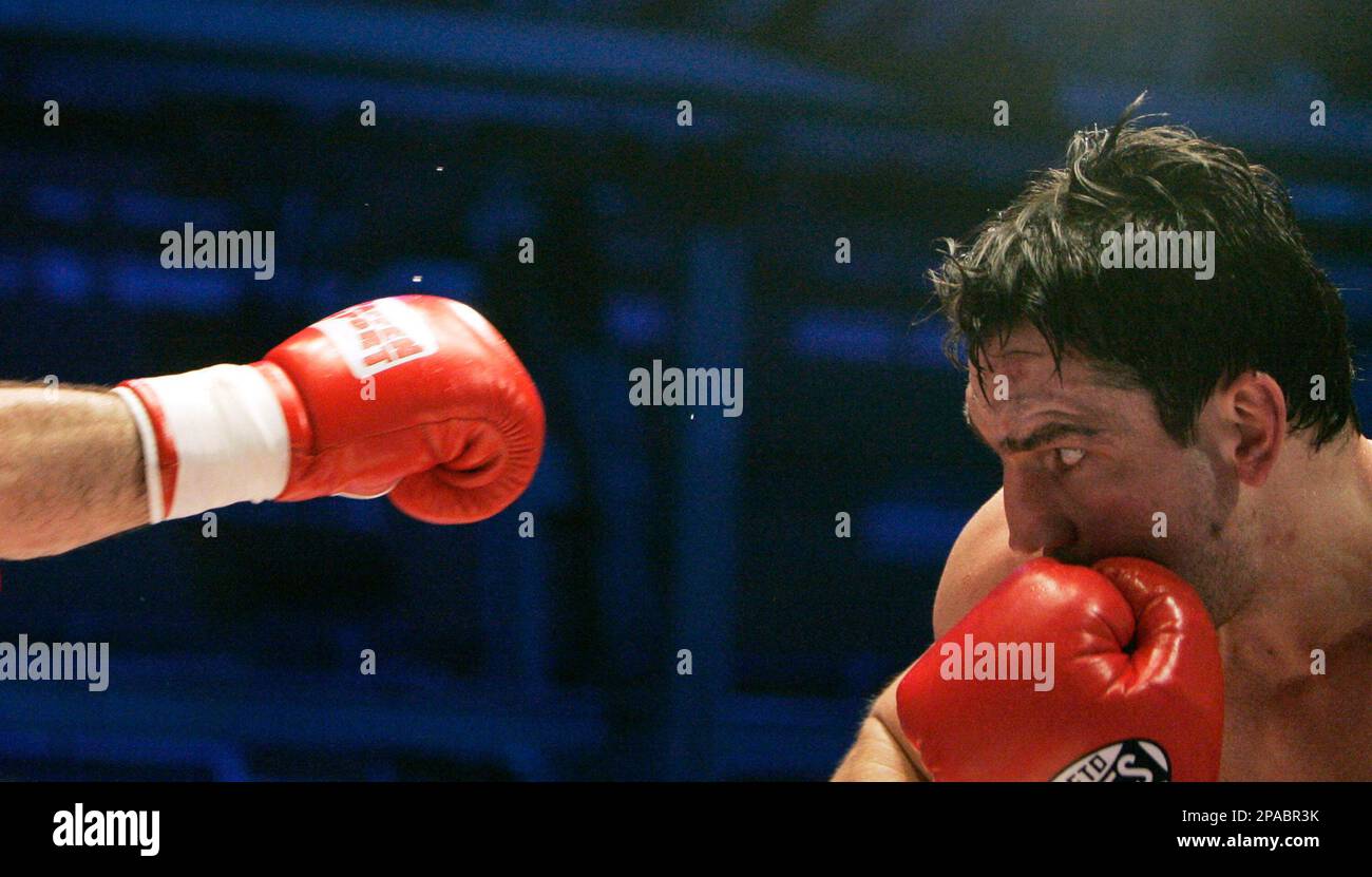 German super middleweight boxer Markus Beyer, right, eyes his opponent ...