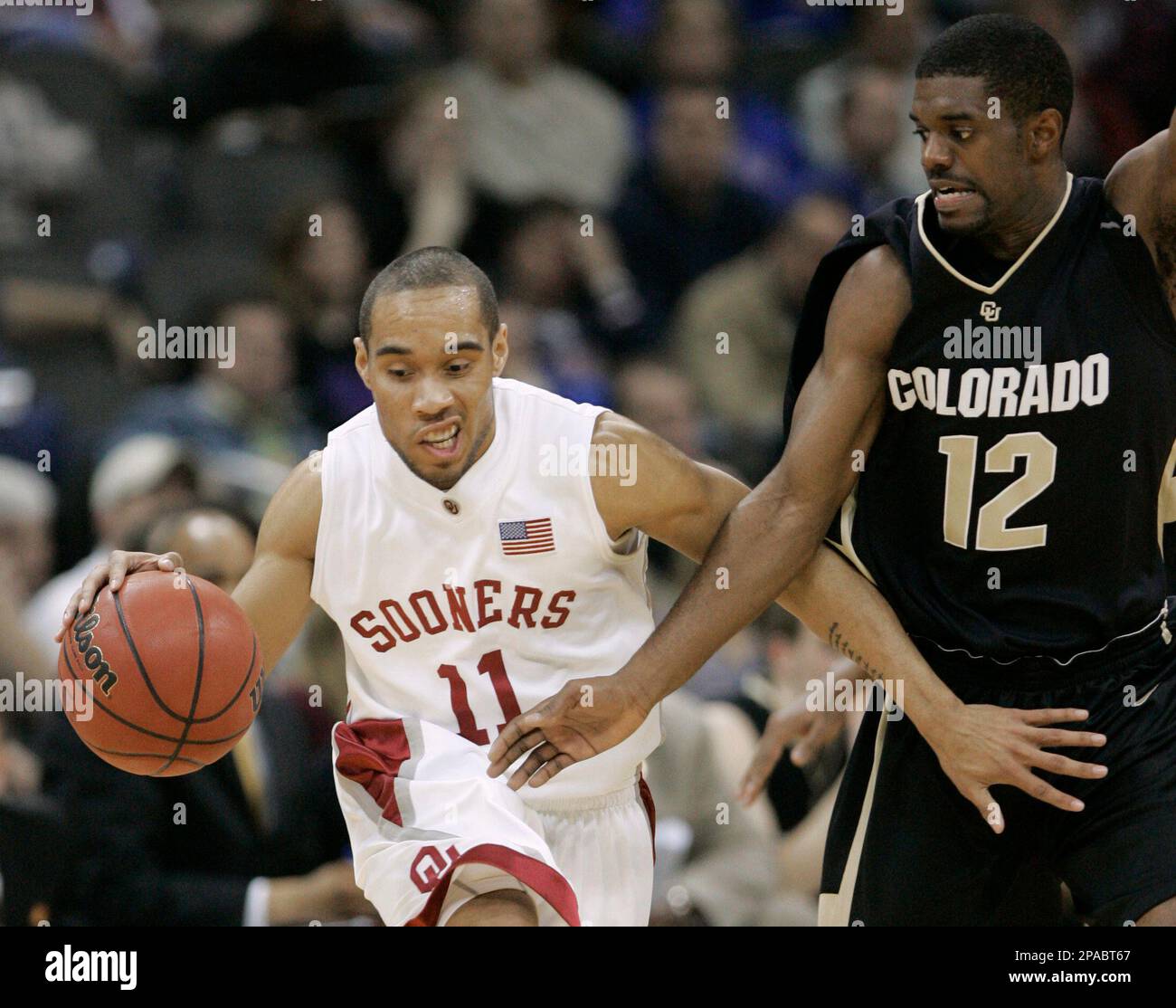 Oklahoma guard Omar Leary (11) and Colorado guard Dwight Thorne II (12 ...