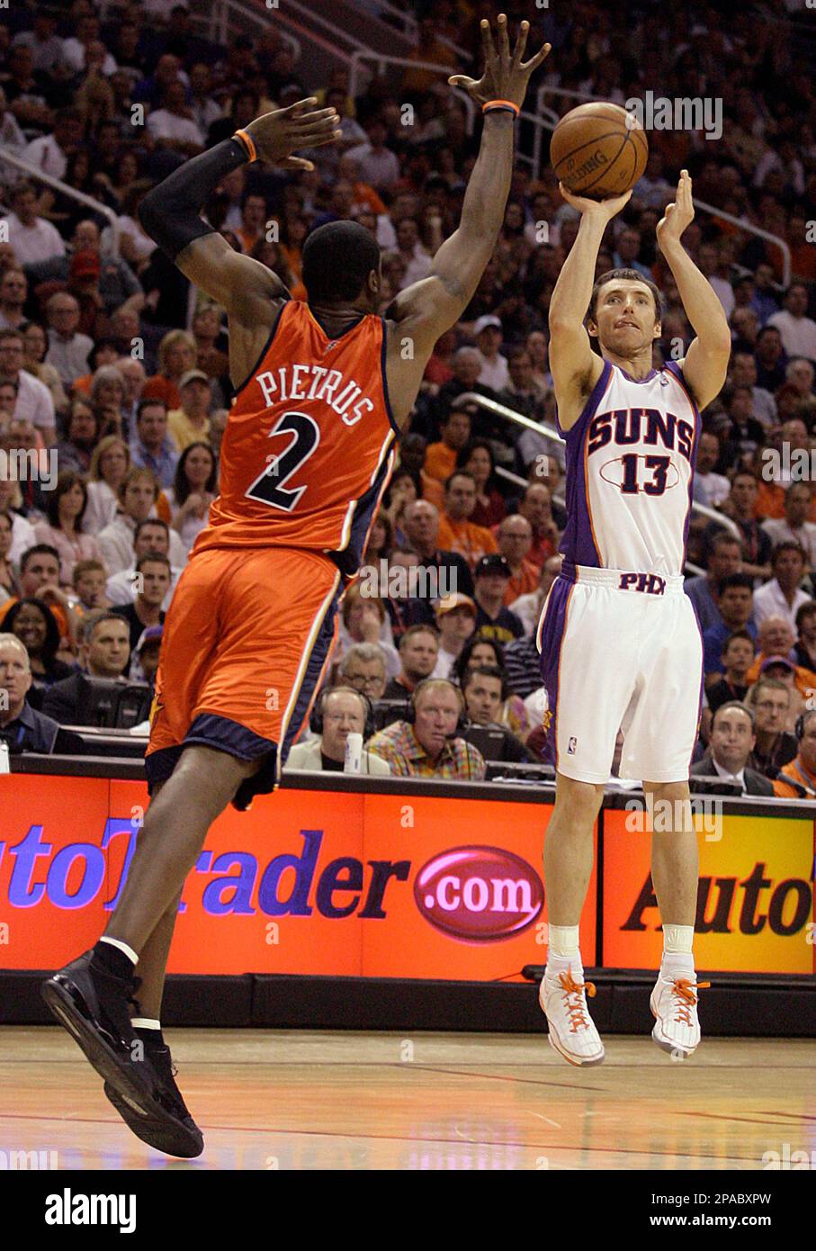 Phoenix Suns guard Steve Nash (13) shoots over Golden State Warriors ...