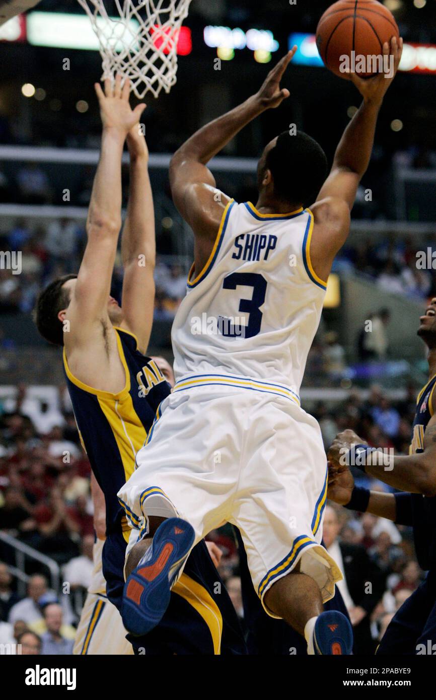 UCLA forward Josh Shipp (3) goes for two points over the California ...