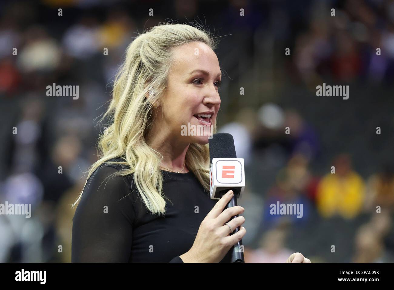KANSAS CITY, MO - MARCH 09: ESPN's Kris Budden reports from courtside ...