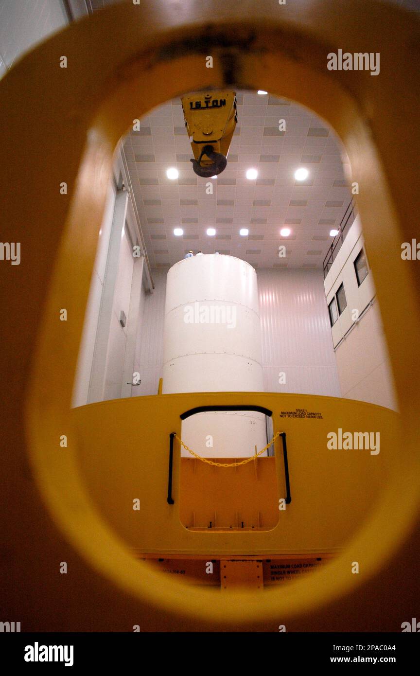 A full-scale mockup of the upper stage of the Ares I rocket stands in ...