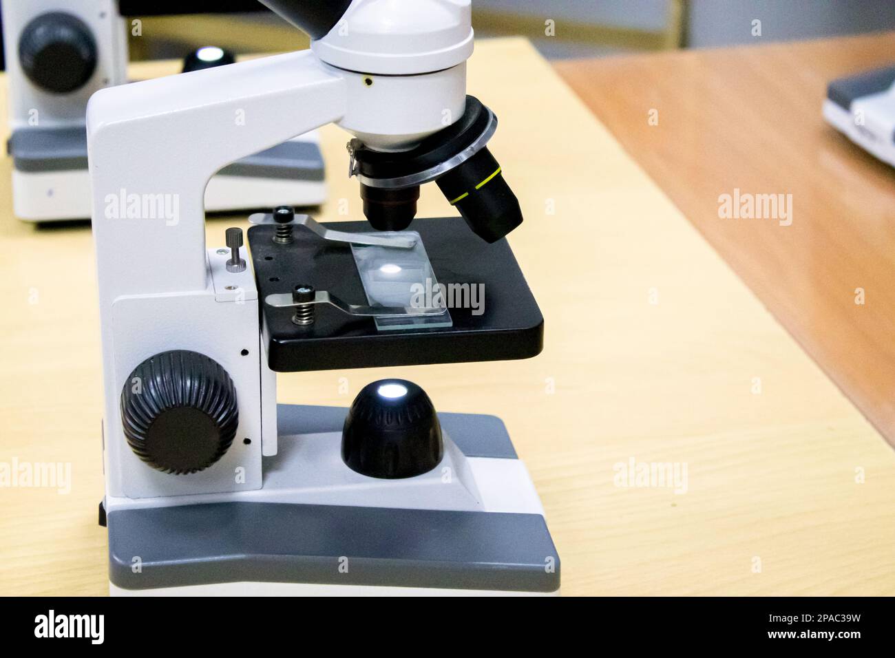 Scientist hands microscope close up hi-res stock photography and images ...
