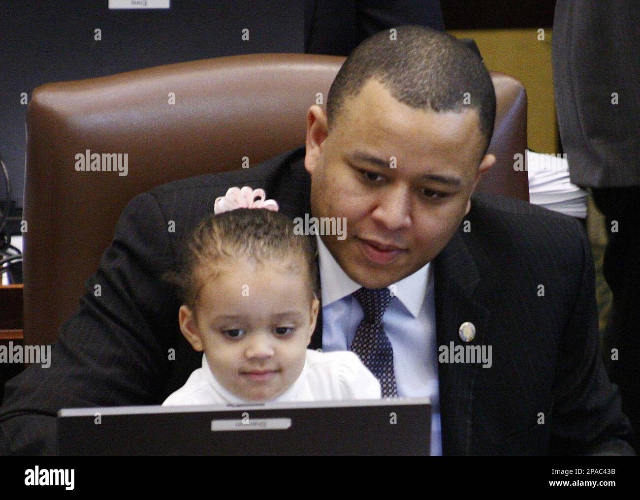 Oklahoma state Rep. T. W. Shannon, R-Lawton, sits with his daughter ...